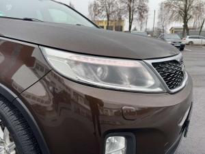 Brown Kia Sorento 2012 in Marijampole, with an engine capacity of 2.20 L and mileage of 238 thousand km for 8999 €, photo 7 on AUTOMOTO.COM.LV