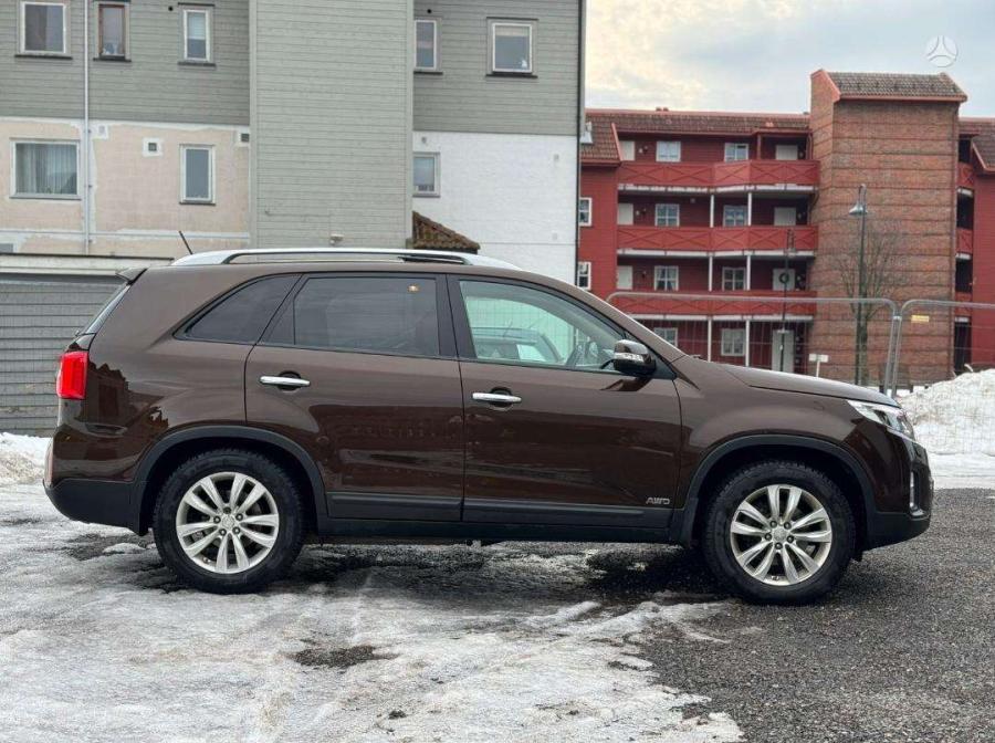 Brūns Kia Sorento 2013 Marijampole, ar dzinēja tilpumu 2.00 L un nobraukumu 138 tūkst. km par 9000 €, foto 7 vietnē AUTOMOTO.COM.LV