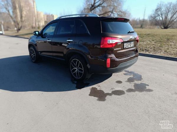 Brūns Kia Sorento 2013 Panevēža, ar dzinēja tilpumu 2.20 L un nobraukumu 272 tūkst. km par 9450 €, foto 10 vietnē AUTOMOTO.COM.LV