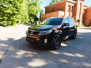 Brown Kia Sorento 2013 in Panevezys, with an engine capacity of 2.20 L and mileage of 273 thousand km for 8950 €, photo  on AUTOMOTO.COM.LV
