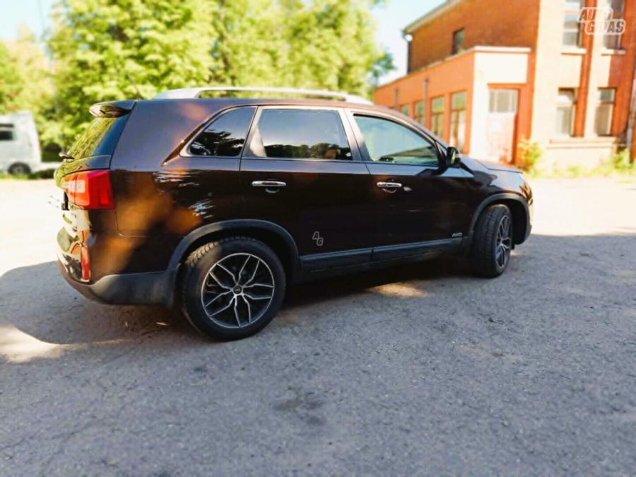 Brūns Kia Sorento 2013 Panevēža, ar dzinēja tilpumu 2.20 L un nobraukumu 273 tūkst. km par 8950 €, foto 17 vietnē AUTOMOTO.COM.LV