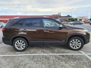 Brūns Kia Sorento 2014 Rīga, ar dzinēja tilpumu 2.20 L un nobraukumu 265 tūkst. km par 11900 €, foto 3 vietnē AUTOMOTO.COM.LV