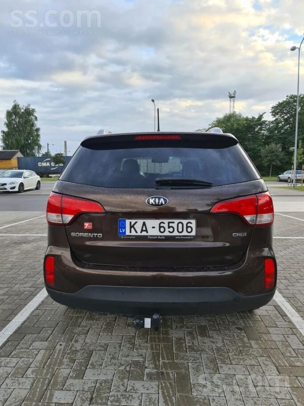Brūns Kia Sorento 2014 Rīga, ar dzinēja tilpumu 2.20 L un nobraukumu 265 tūkst. km par 11900 €, foto 3 vietnē AUTOMOTO.COM.LV