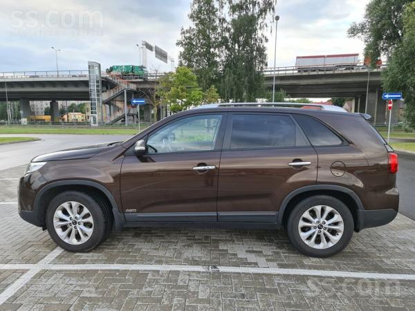 Brūns Kia Sorento 2014 Rīga, ar dzinēja tilpumu 2.20 L un nobraukumu 265 tūkst. km par 11900 €, foto 4 vietnē AUTOMOTO.COM.LV