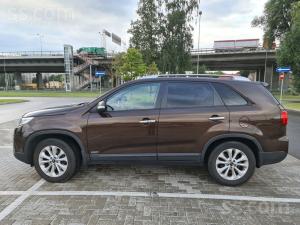 Brūns Kia Sorento 2014 Rīga, ar dzinēja tilpumu 2.20 L un nobraukumu 265 tūkst. km par 11900 €, foto 5 vietnē AUTOMOTO.COM.LV