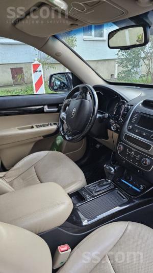 Brūns Kia Sorento 2014 Rīga, ar dzinēja tilpumu 2.20 L un nobraukumu 265 tūkst. km par 11900 €, foto 6 vietnē AUTOMOTO.COM.LV
