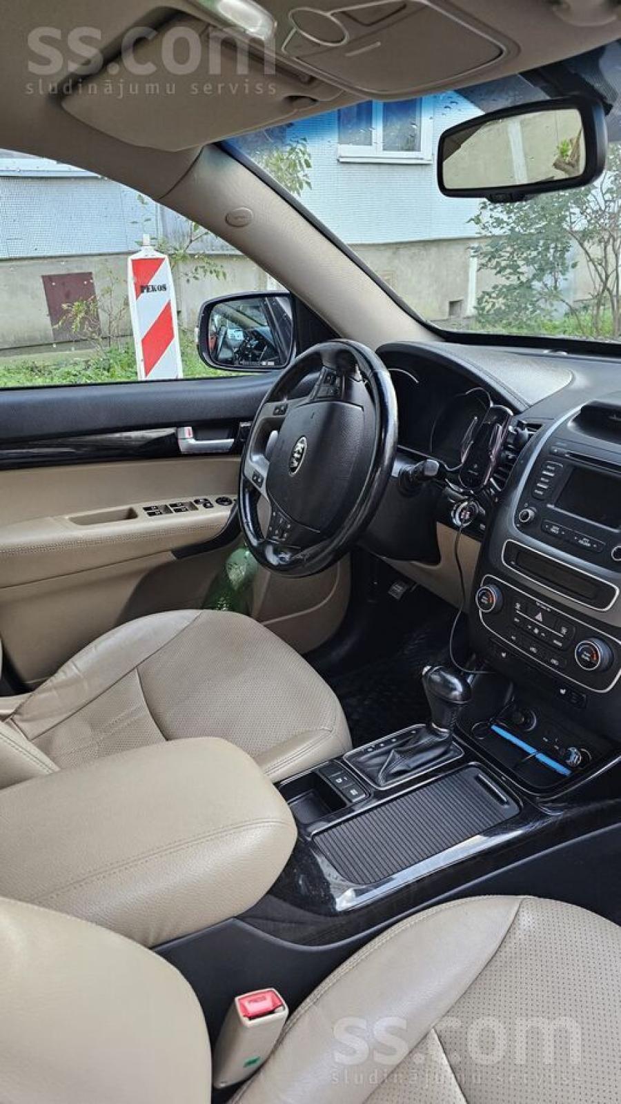 Brūns Kia Sorento 2014 Rīga, ar dzinēja tilpumu 2.20 L un nobraukumu 265 tūkst. km par 11900 €, foto 6 vietnē AUTOMOTO.COM.LV