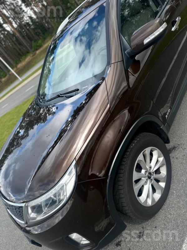 Brown Kia Sorento 2014 in Riga, with an engine capacity of 2.20 L and mileage of 268 thousand km for 11900 €, photo 5 on AUTOMOTO.COM.LV