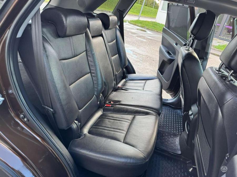 Brown Kia Sorento 2014 in Jonava, with an engine capacity of 2.20 L and mileage of 281 thousand km for 9700 €, photo 10 on AUTOMOTO.COM.LV