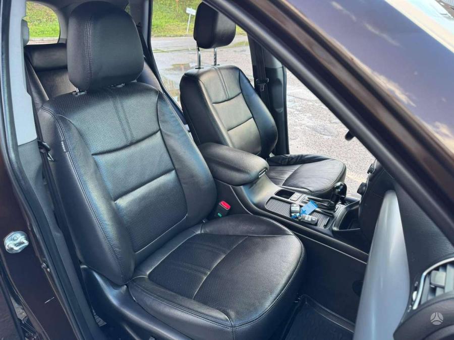 Brown Kia Sorento 2014 in Jonava, with an engine capacity of 2.20 L and mileage of 281 thousand km for 9700 €, photo 12 on AUTOMOTO.COM.LV