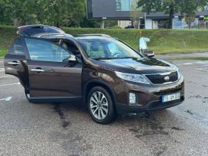 Brown Kia Sorento 2014 in Jonava, with an engine capacity of 2.20 L and mileage of 281 thousand km for 9700 €, photo 14 on AUTOMOTO.COM.LV
