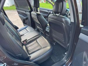 Brown Kia Sorento 2014 in Jonava, with an engine capacity of 2.20 L and mileage of 281 thousand km for 9700 €, photo 22 on AUTOMOTO.COM.LV