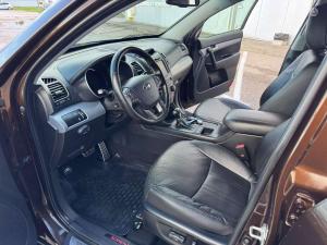 Brown Kia Sorento 2014 in Jonava, with an engine capacity of 2.20 L and mileage of 281 thousand km for 9700 €, photo 24 on AUTOMOTO.COM.LV