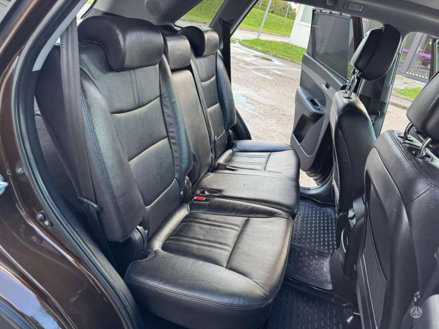 Brown Kia Sorento 2014 in Jonava, with an engine capacity of 2.20 L and mileage of 281 thousand km for 9700 €, photo 26 on AUTOMOTO.COM.LV