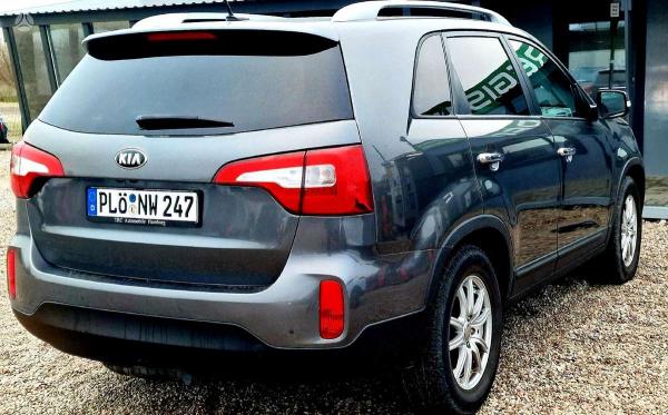 Brown Kia Sorento 2015 in Kretinga, with an engine capacity of 2.20 L and mileage of 114 thousand km for 12499 €, photo 11 on AUTOMOTO.COM.LV