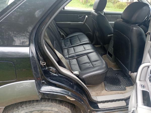 Kia Sorento 2006 in Kaunas, with an engine capacity of 2.50 L and mileage of 288 thousand km for 1950 €, photo 6 on AUTOMOTO.COM.LV