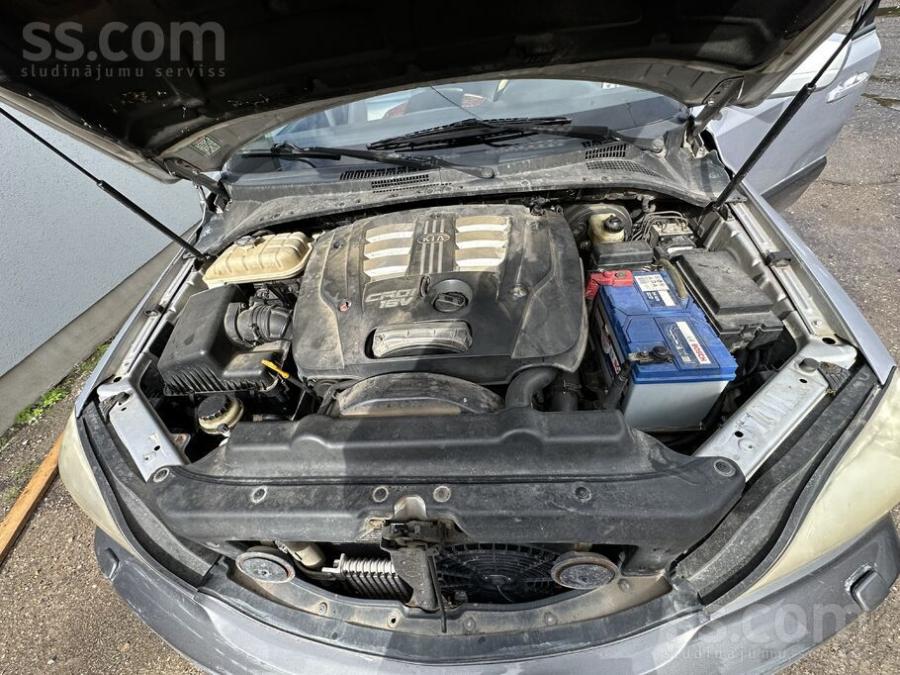 Grey Kia Sorento 2006 in Jelgava, with an engine capacity of 2.50 L and mileage of 234 thousand km for 2000 €, photo 12 on AUTOMOTO.COM.LV