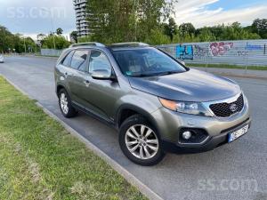 Grey Kia Sorento 2010 in Riga, with an engine capacity of 2.20 L and mileage of 259 thousand km for 7950 €, photo  on AUTOMOTO.COM.LV