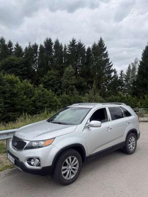 Grey Kia Sorento 2011 in Siauliai, with an engine capacity of 2.35 L and mileage of 180 thousand km for 6650 €, photo  on AUTOMOTO.COM.LV