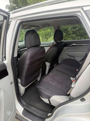 Grey Kia Sorento 2011 in Siauliai, with an engine capacity of 2.35 L and mileage of 180 thousand km for 6650 €, photo 9 on AUTOMOTO.COM.LV