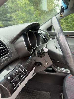 Grey Kia Sorento 2011 in Siauliai, with an engine capacity of 2.35 L and mileage of 180 thousand km for 6650 €, photo 10 on AUTOMOTO.COM.LV