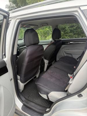 Grey Kia Sorento 2011 in Siauliai, with an engine capacity of 2.40 L and mileage of 180 thousand km for 6650 €, photo 9 on AUTOMOTO.COM.LV