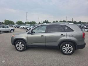 Grey Kia Sorento 2012 in Marijampole, with an engine capacity of 2.20 L and mileage of 260 thousand km for 4990 €, photo 4 on AUTOMOTO.COM.LV