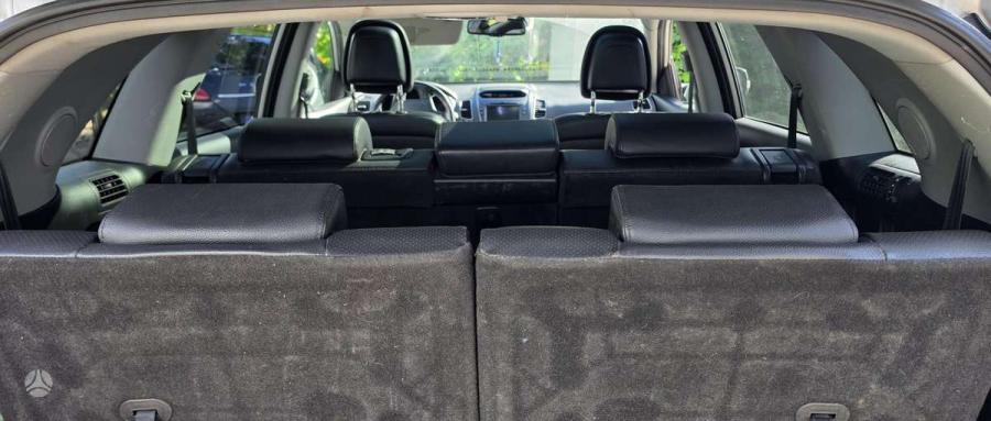 Grey Kia Sorento 2013 in Vilnius, with an engine capacity of 2.20 L and mileage of 270 thousand km for 6300 €, photo 16 on AUTOMOTO.COM.LV