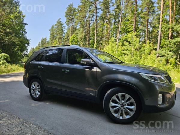 Grey Kia Sorento 2013 in Riga, with an engine capacity of 2.20 L and mileage of 225 thousand km for 9950 €, photo 9 on AUTOMOTO.COM.LV