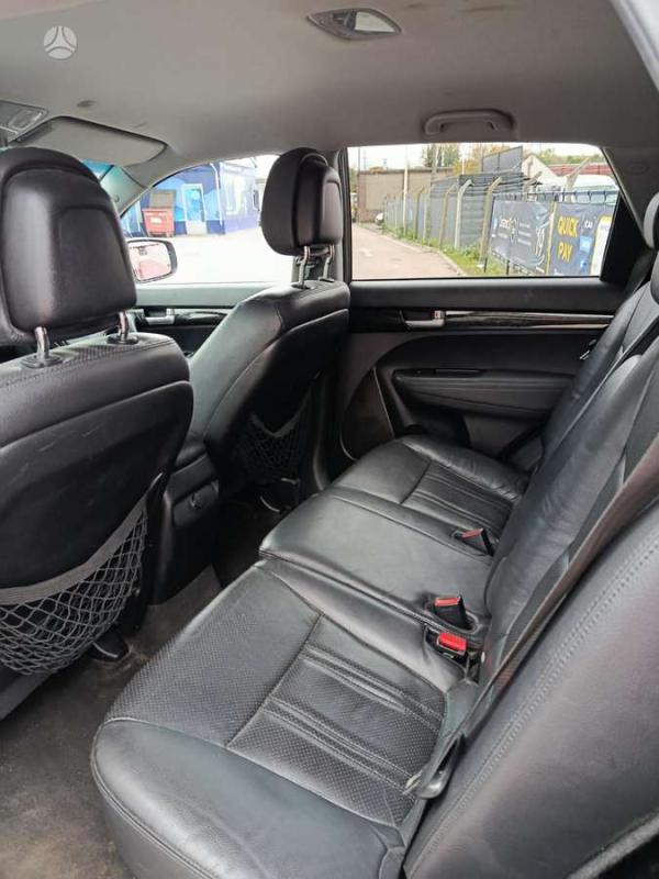 Grey Kia Sorento 2014 in Kaunas, with an engine capacity of 2.20 L and mileage of 201 thousand km for 4100 €, photo 11 on AUTOMOTO.COM.LV