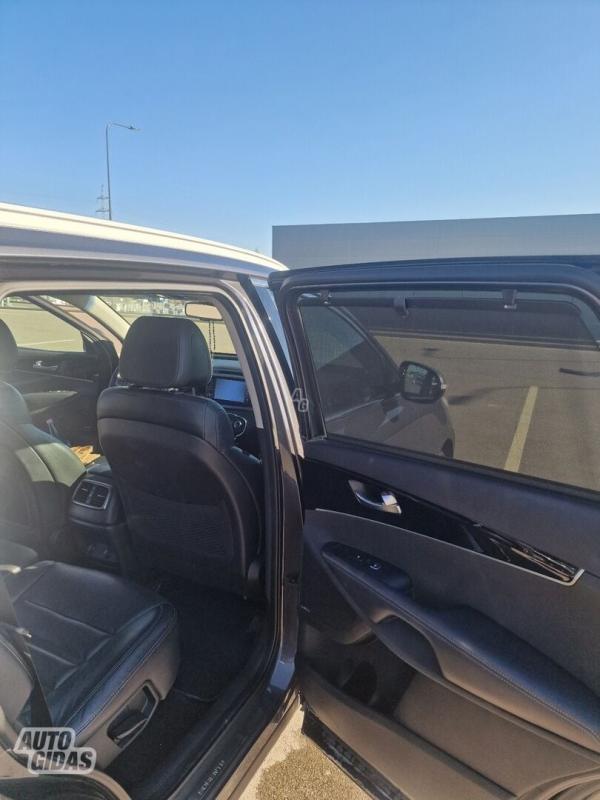 Grey Kia Sorento 2015 in Kaunas, with an engine capacity of 2.20 L and mileage of 290 thousand km for 13999 €, photo 7 on AUTOMOTO.COM.LV