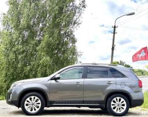 Grey Kia Sorento 2015 in Siauliai, with an engine capacity of 2.20 L and mileage of 223 thousand km for 12999 €, photo 14 on AUTOMOTO.COM.LV