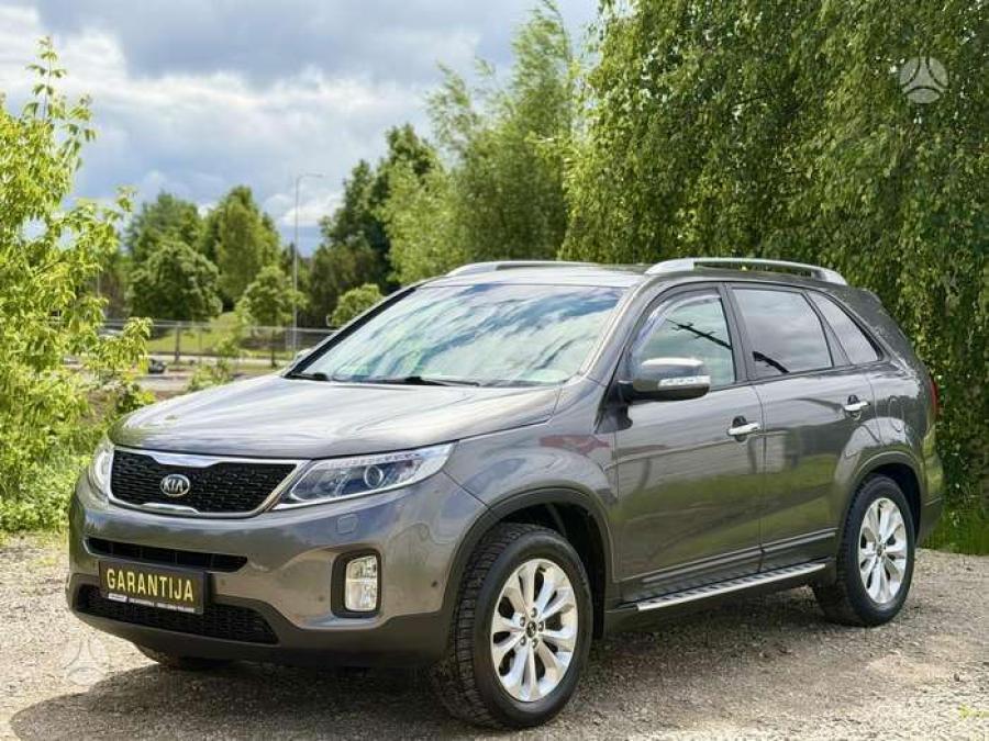 Grey Kia Sorento 2015 in Siauliai, with an engine capacity of 2.20 L and mileage of 223 thousand km for 12999 €, photo 19 on AUTOMOTO.COM.LV
