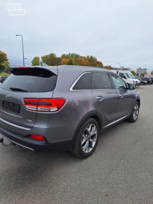 Grey Kia Sorento 2015 in Kaunas, with an engine capacity of 2.20 L and mileage of 214 thousand km for 13300 €, photo 7 on AUTOMOTO.COM.LV