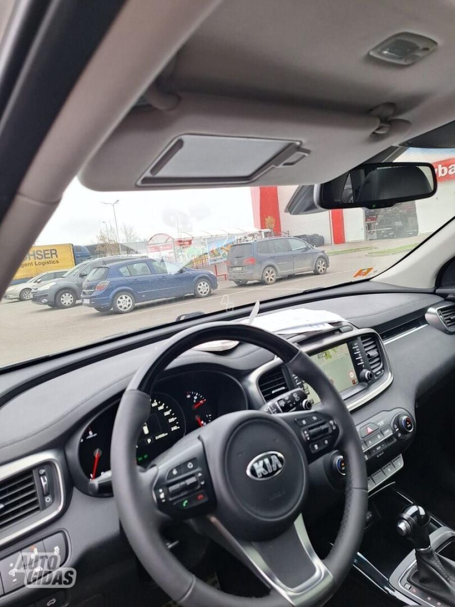 Grey Kia Sorento 2015 in Kaunas, with an engine capacity of 2.20 L and mileage of 214 thousand km for 13300 €, photo 24 on AUTOMOTO.COM.LV