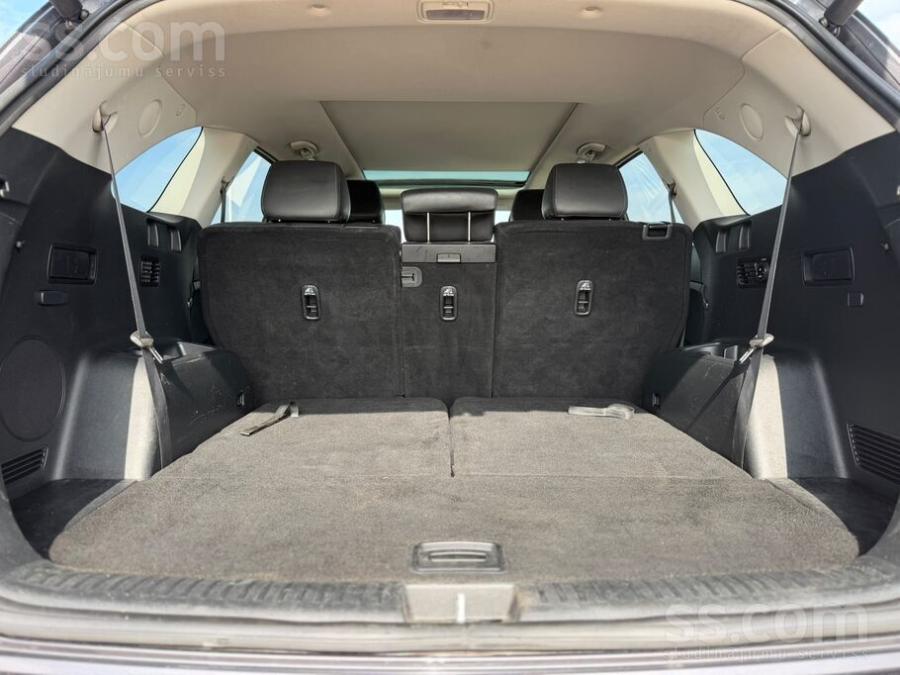 Grey Kia Sorento 2016 in Riga, with an engine capacity of 2.20 L and mileage of 198 thousand km for 16500 €, photo 15 on AUTOMOTO.COM.LV