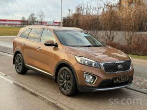 Orange Kia Sorento 2015 in Riga, with an engine capacity of 2.20 L and mileage of 209 thousand km for 12500 €, photo 3 on AUTOMOTO.COM.LV