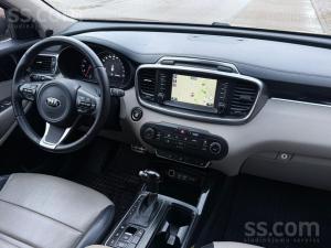 Orange Kia Sorento 2015 in Riga, with an engine capacity of 2.20 L and mileage of 209 thousand km for 12500 €, photo 20 on AUTOMOTO.COM.LV