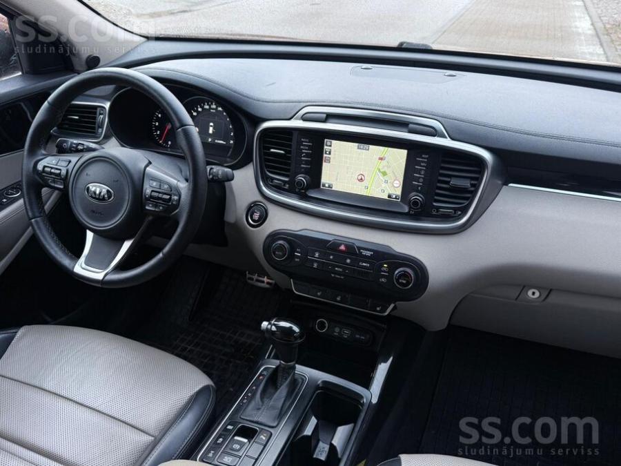 Orange Kia Sorento 2015 in Riga, with an engine capacity of 2.20 L and mileage of 209 thousand km for 12500 €, photo 20 on AUTOMOTO.COM.LV