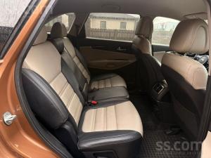 Orange Kia Sorento 2015 in Riga, with an engine capacity of 2.20 L and mileage of 209 thousand km for 12500 €, photo 23 on AUTOMOTO.COM.LV