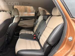 Orange Kia Sorento 2015 in Riga, with an engine capacity of 2.20 L and mileage of 209 thousand km for 12500 €, photo 26 on AUTOMOTO.COM.LV