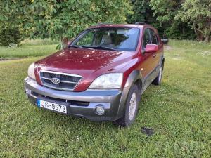 Sarkans Kia Sorento 2004 Rīga, ar dzinēja tilpumu 2.50 L un nobraukumu 287 tūkst. km par 1190 €, foto  vietnē AUTOMOTO.COM.LV