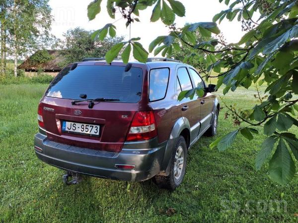 Sarkans Kia Sorento 2004 Rīga, ar dzinēja tilpumu 2.50 L un nobraukumu 287 tūkst. km par 1190 €, foto 3 vietnē AUTOMOTO.COM.LV