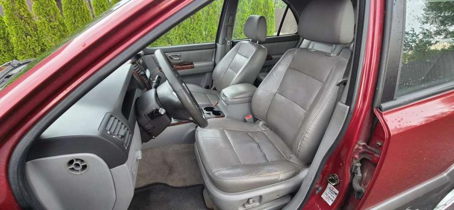 Red Kia Sorento 2004 in Vilnius, with an engine capacity of 2.49 L and mileage of 343 thousand km for 1200 €, photo 12 on AUTOMOTO.COM.LV
