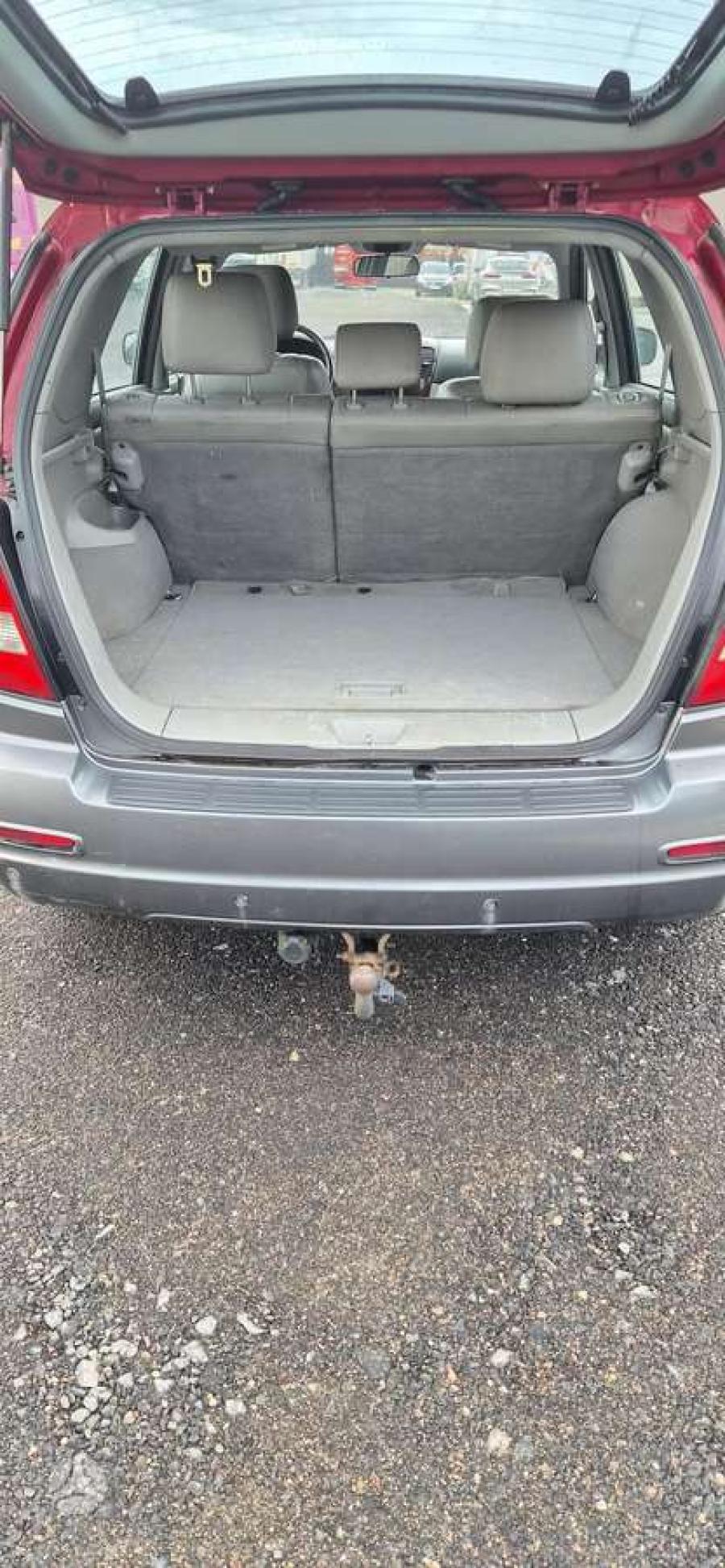 Red Kia Sorento 2004 in Vilnius, with an engine capacity of 2.49 L and mileage of 343 thousand km for 1200 €, photo 15 on AUTOMOTO.COM.LV