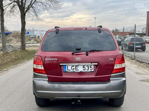 Red Kia Sorento 2006 in Silute, with an engine capacity of 2.50 L and mileage of 274 thousand km for 2500 €, photo 3 on AUTOMOTO.COM.LV