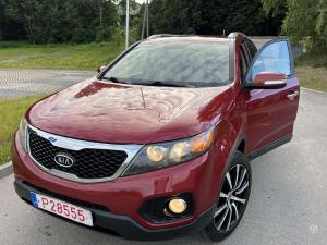 Red Kia Sorento 2010 in Prienai, with an engine capacity of 2.20 L and mileage of 224 thousand km for 4700 €, photo  on AUTOMOTO.COM.LV