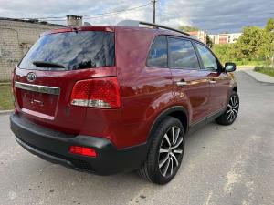 Sarkans Kia Sorento 2010 Prienai, ar dzinēja tilpumu 2.20 L un nobraukumu 224 tūkst. km par 4700 €, foto 8 vietnē AUTOMOTO.COM.LV
