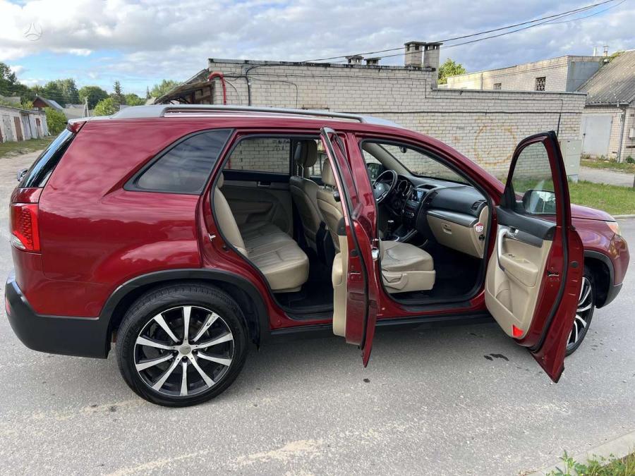 Sarkans Kia Sorento 2010 Prienai, ar dzinēja tilpumu 2.20 L un nobraukumu 224 tūkst. km par 4700 €, foto 12 vietnē AUTOMOTO.COM.LV
