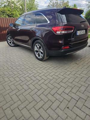 Red Kia Sorento 2016 in Vilnius, with an engine capacity of 2.20 L and mileage of 233 thousand km for 15555 €, photo 5 on AUTOMOTO.COM.LV
